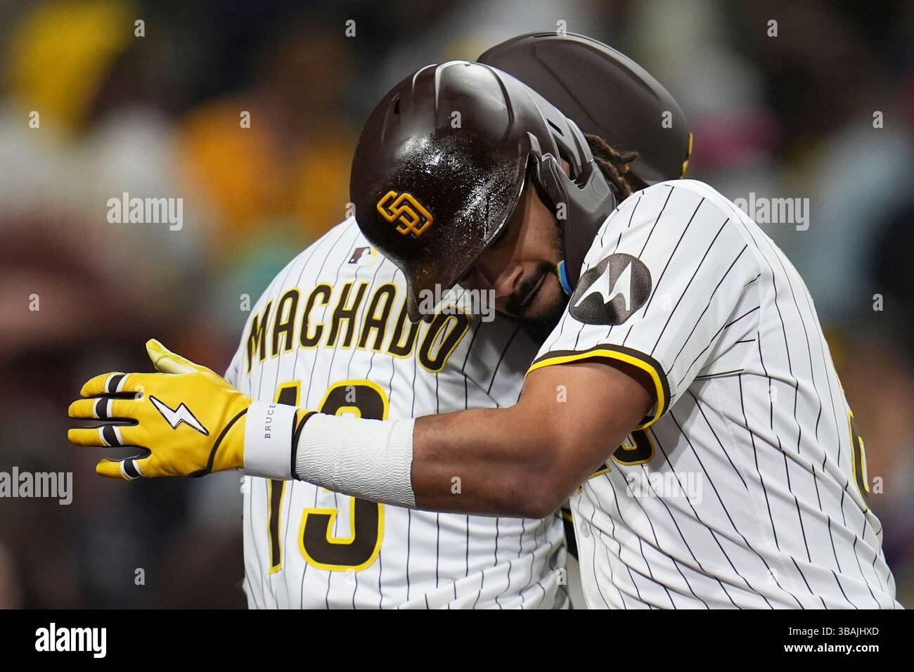 San Diego Padres' Fernando Tatis Jr., front, celebrates with teammate ...