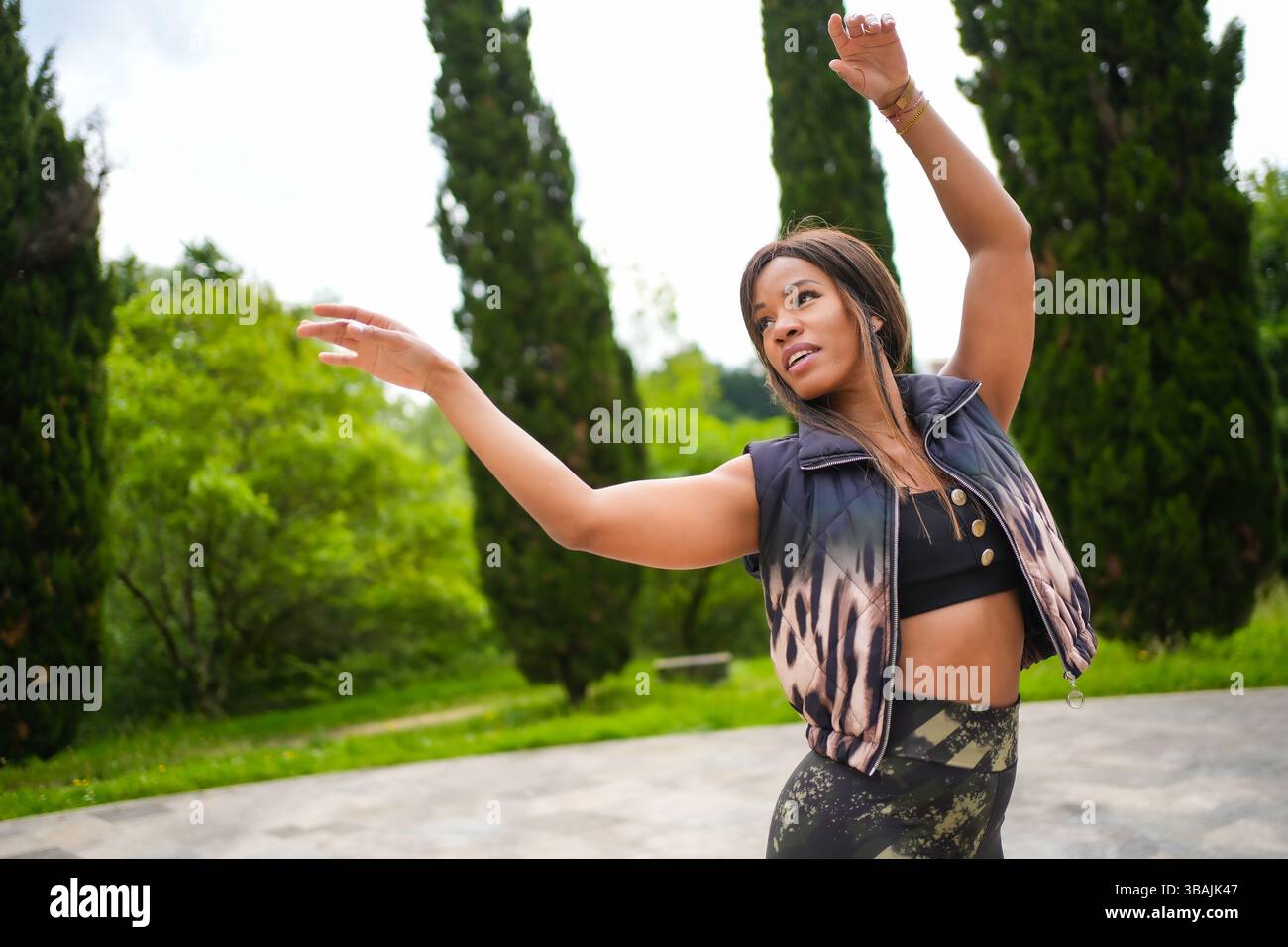 Female latin young sensual dancer expressing emotion dancing cuban ...