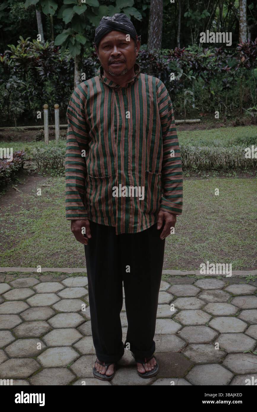 Malang, East Java, Indonesia. 12th May, 2025. A resident poses in ...