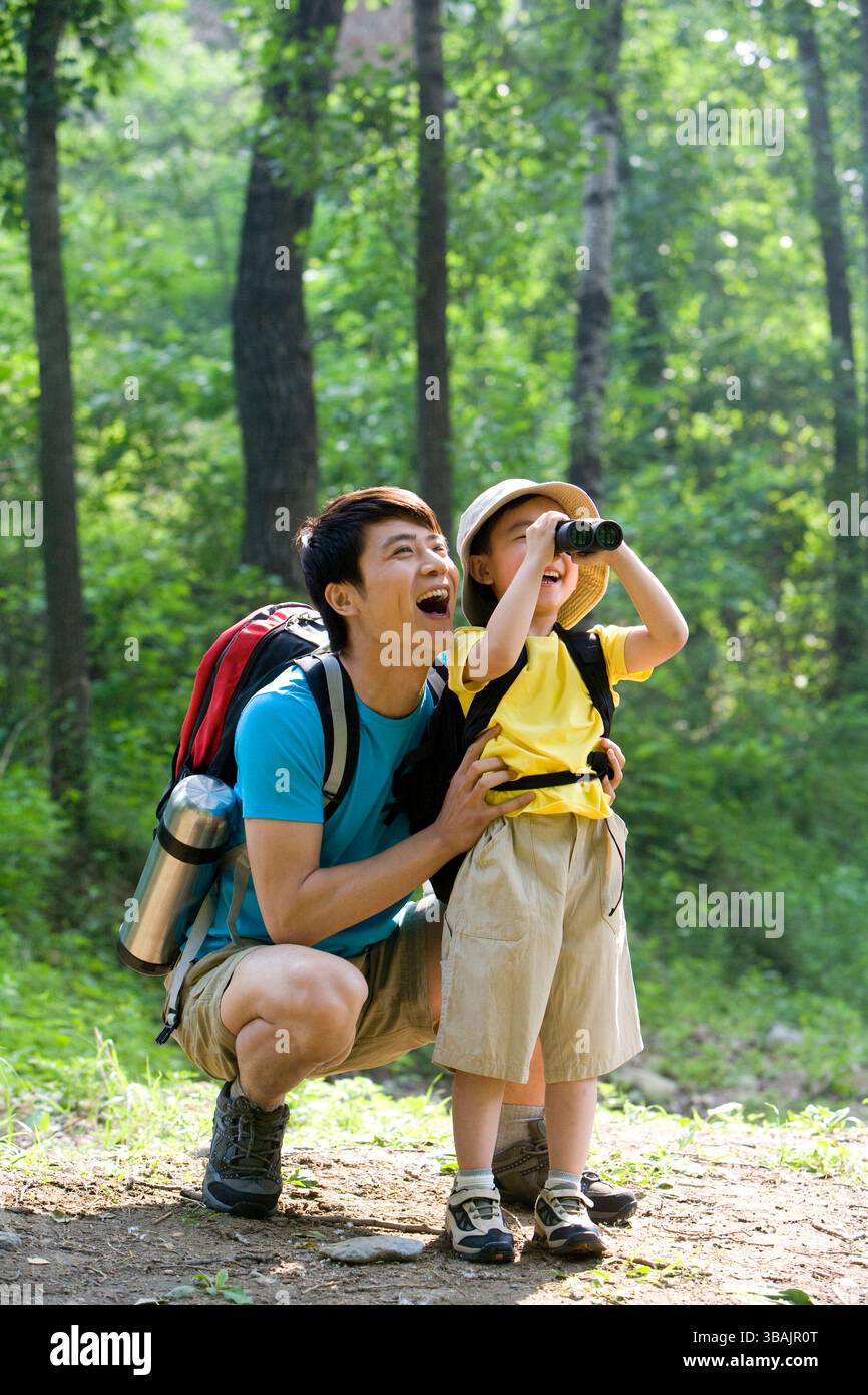Chinese father and son in the great outdoors Stock Photo - Alamy