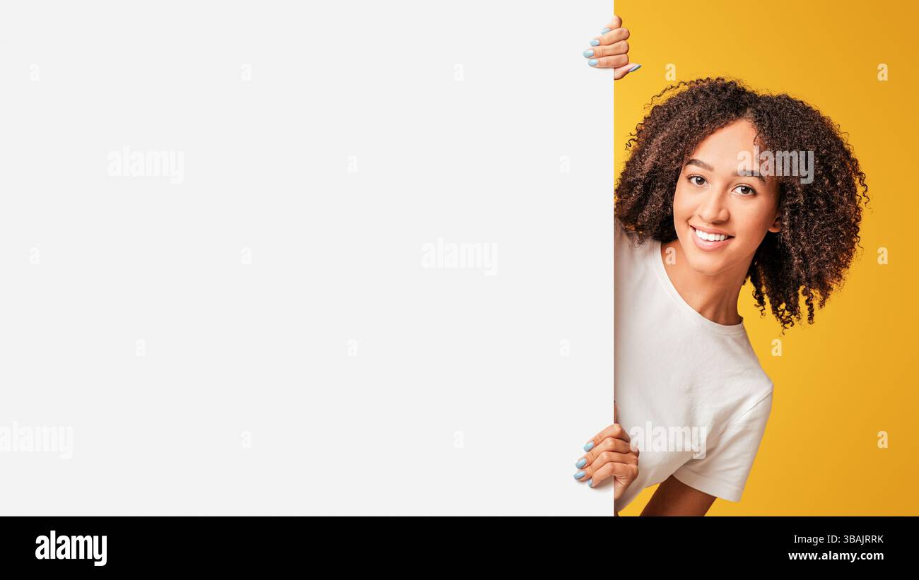 Joyful human emotions and advertising. Beautiful, playful african ...