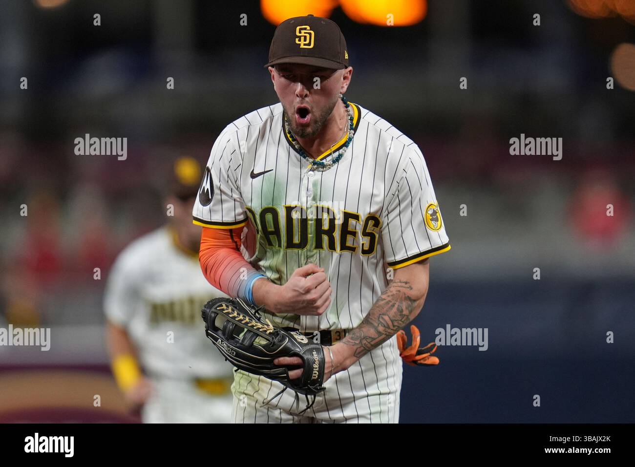 San Diego Padres center fielder Jackson Merrill celebrates after making ...