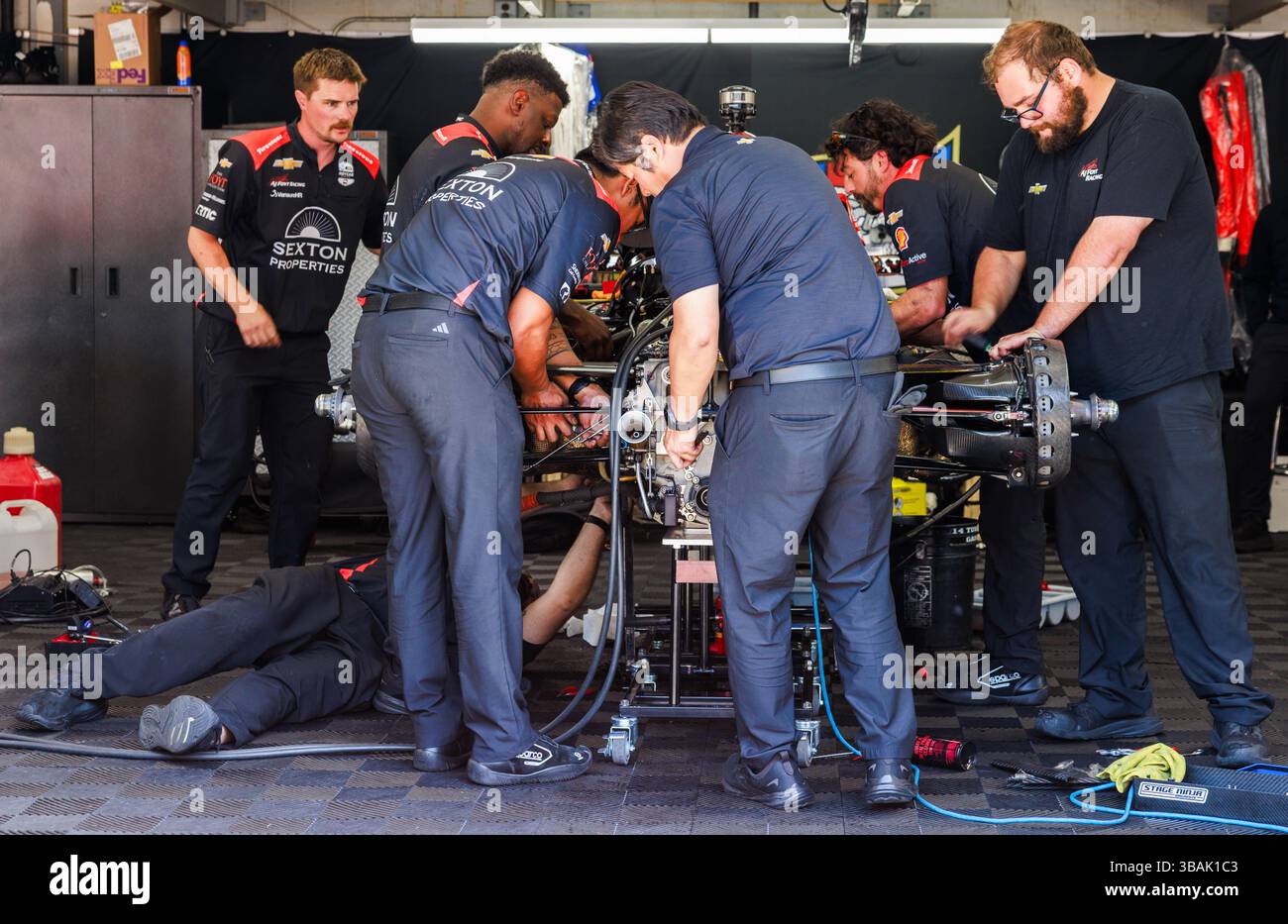 Indianapolis, United States. 10th May, 2025. Crew members replace an ...