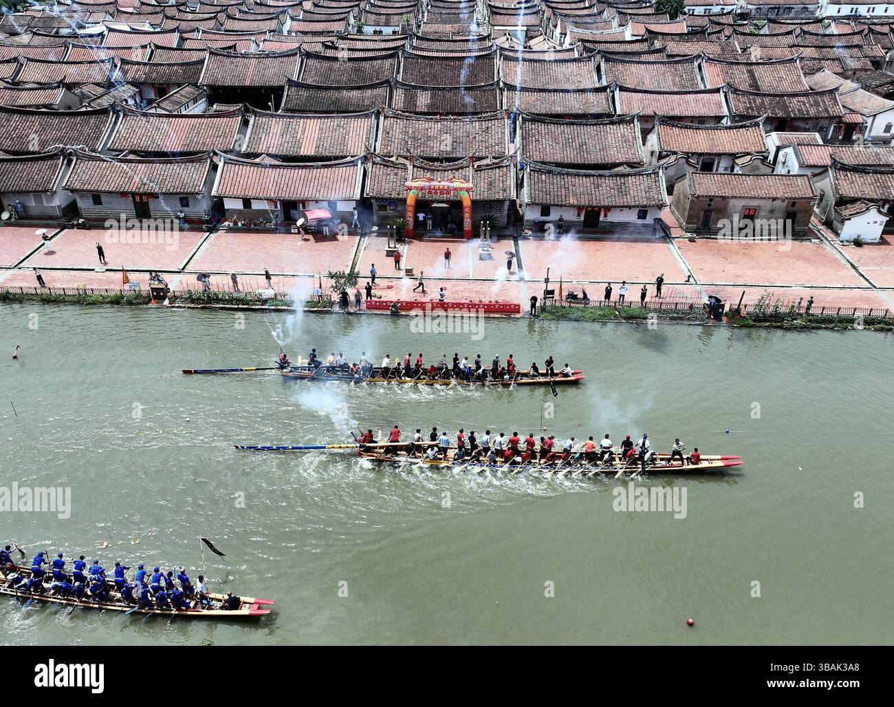 **CHINESE MAINLAND, HONG KONG, MACAU AND TAIWAN OUT** Local villagers ...