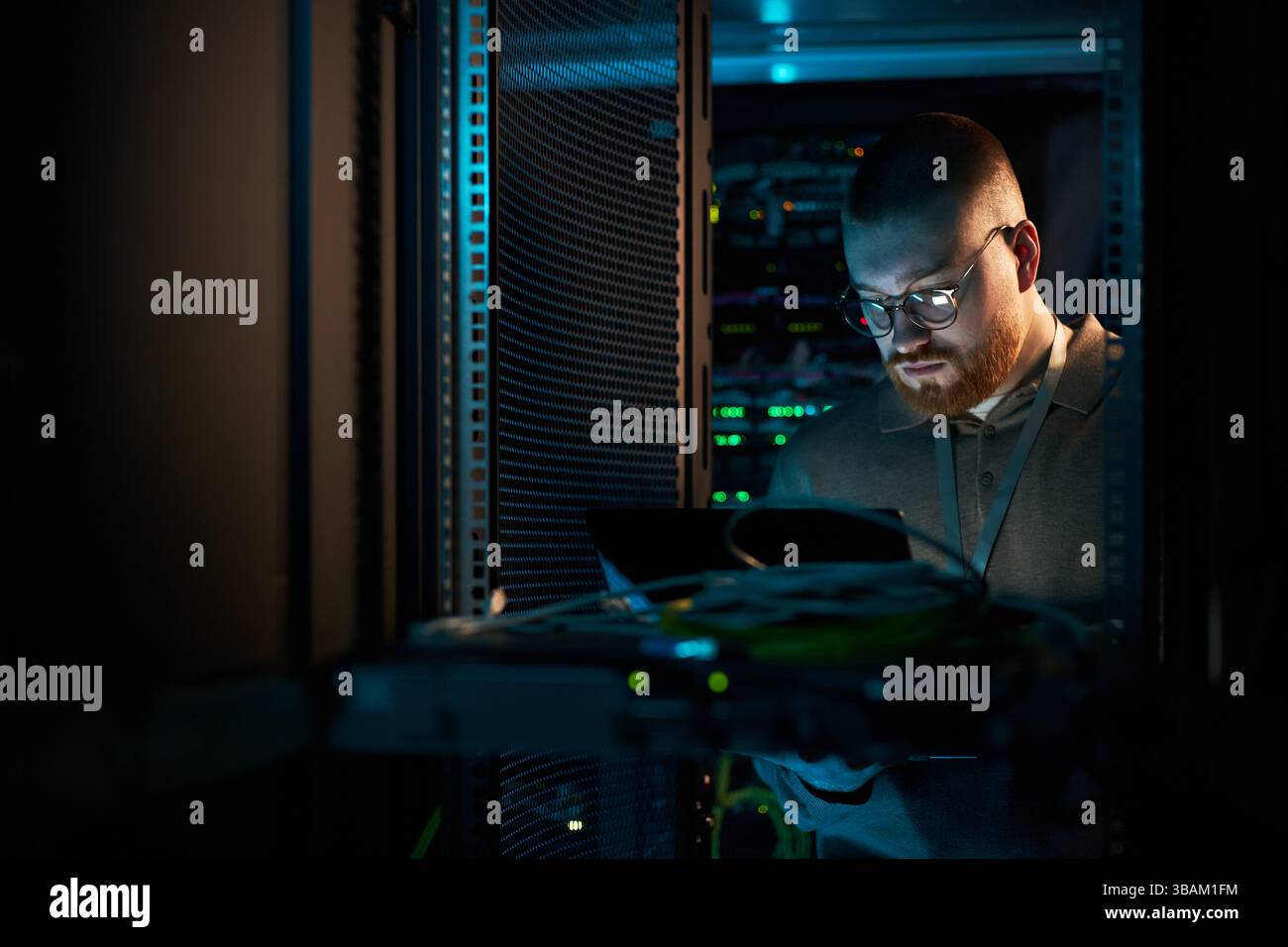 Professional inspecting server racks hi-res stock photography and ...