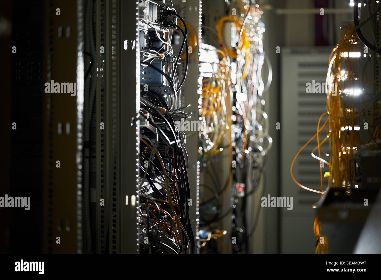 Illuminated Data Center with Complex Wiring Structures Stock Photo - Alamy