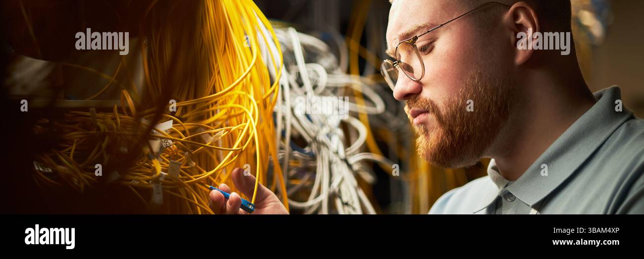 Technician Monitoring Network Cables and Connections Stock Photo - Alamy