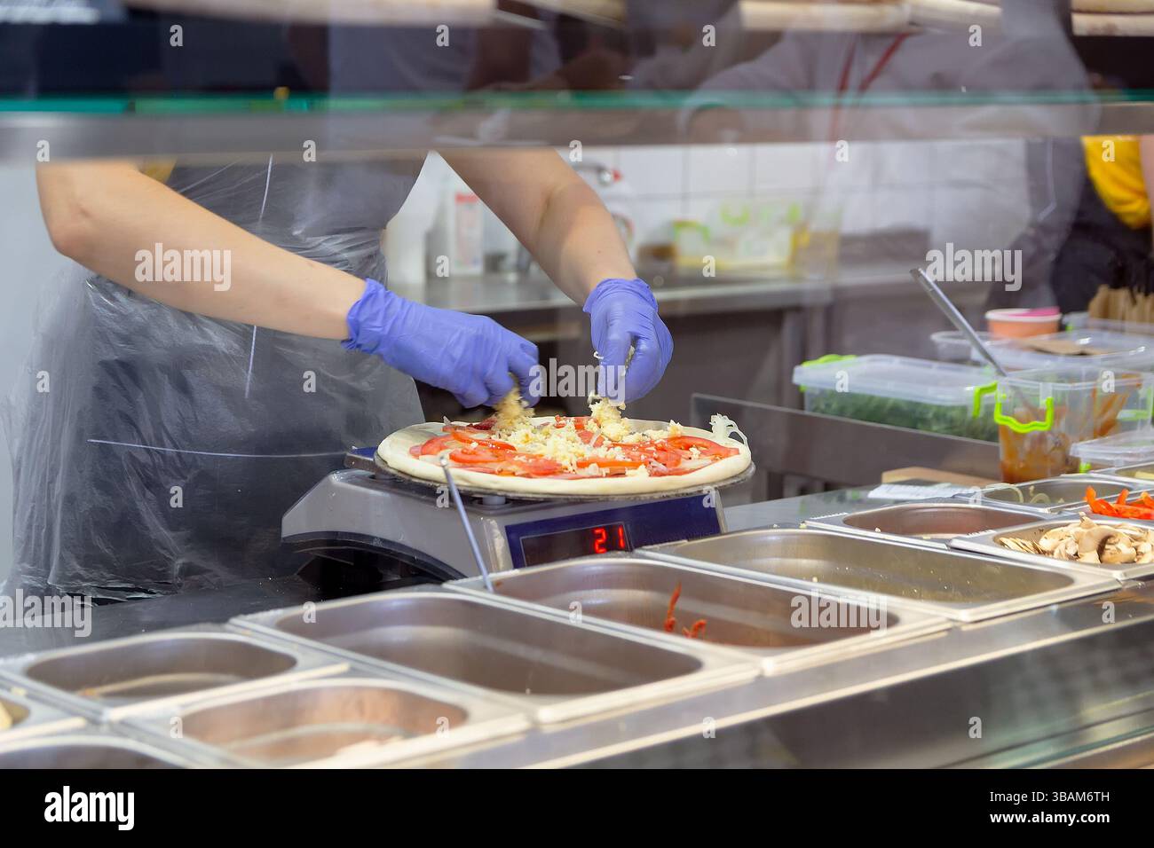 Process of making pizza in the bakery. Food Stock Photo - Alamy