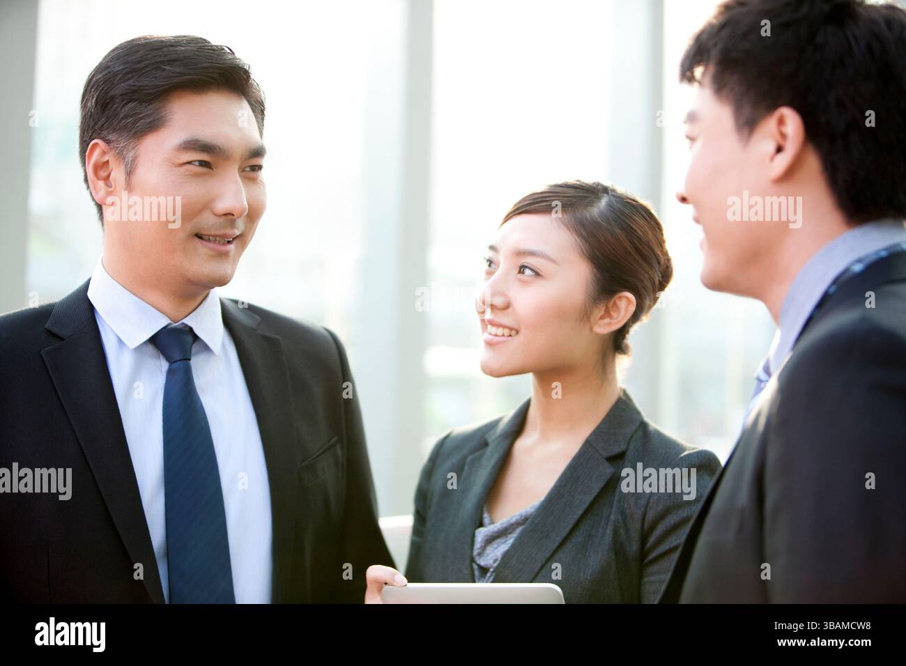 Chinese business people in office Stock Photo - Alamy