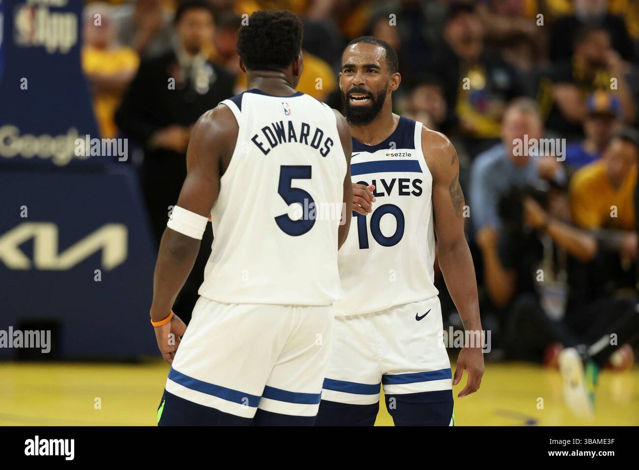 Minnesota Timberwolves guard Anthony Edwards (5) celebrates with guard ...