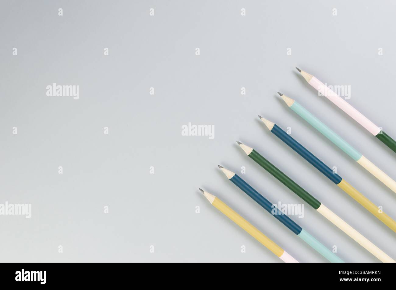 Top view of colorful pencils on grey background. School, office, art ...