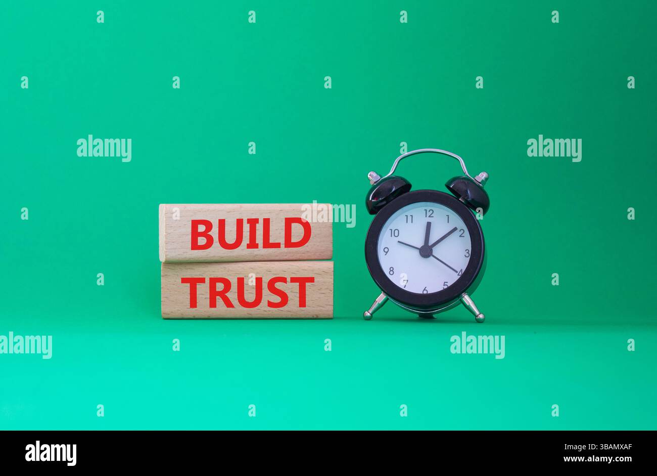 Build trust symbol. Wooden blocks with words Build trust. Beautiful ...