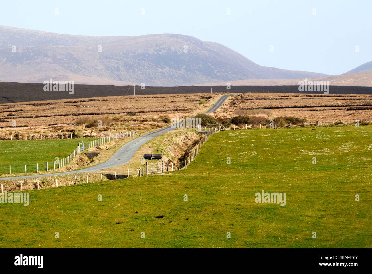 local road out into the wilderness and nephin beg range in the wild ...