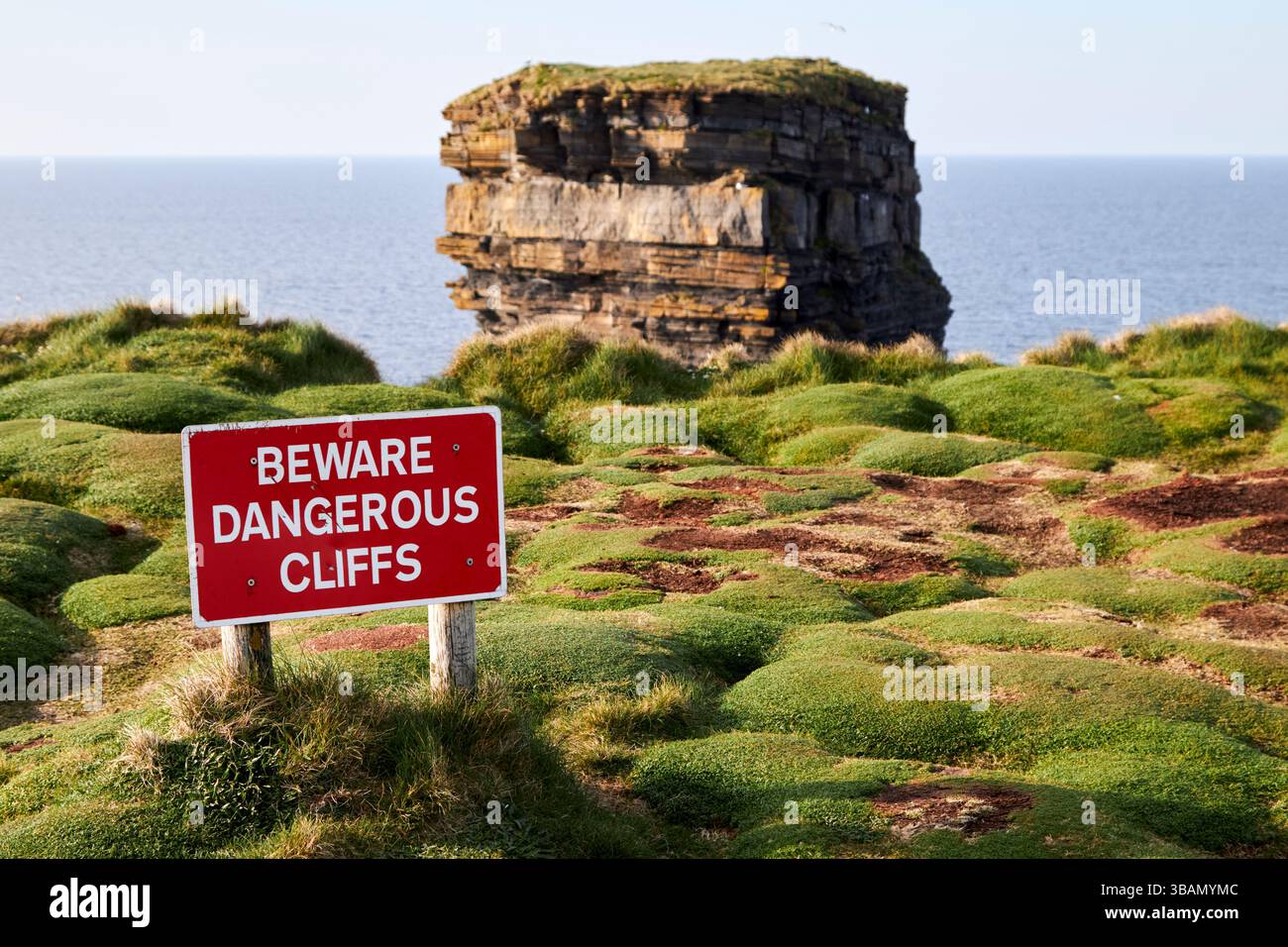 beware dangerous cliffs sign near the dun briste sea stack cliffs ...