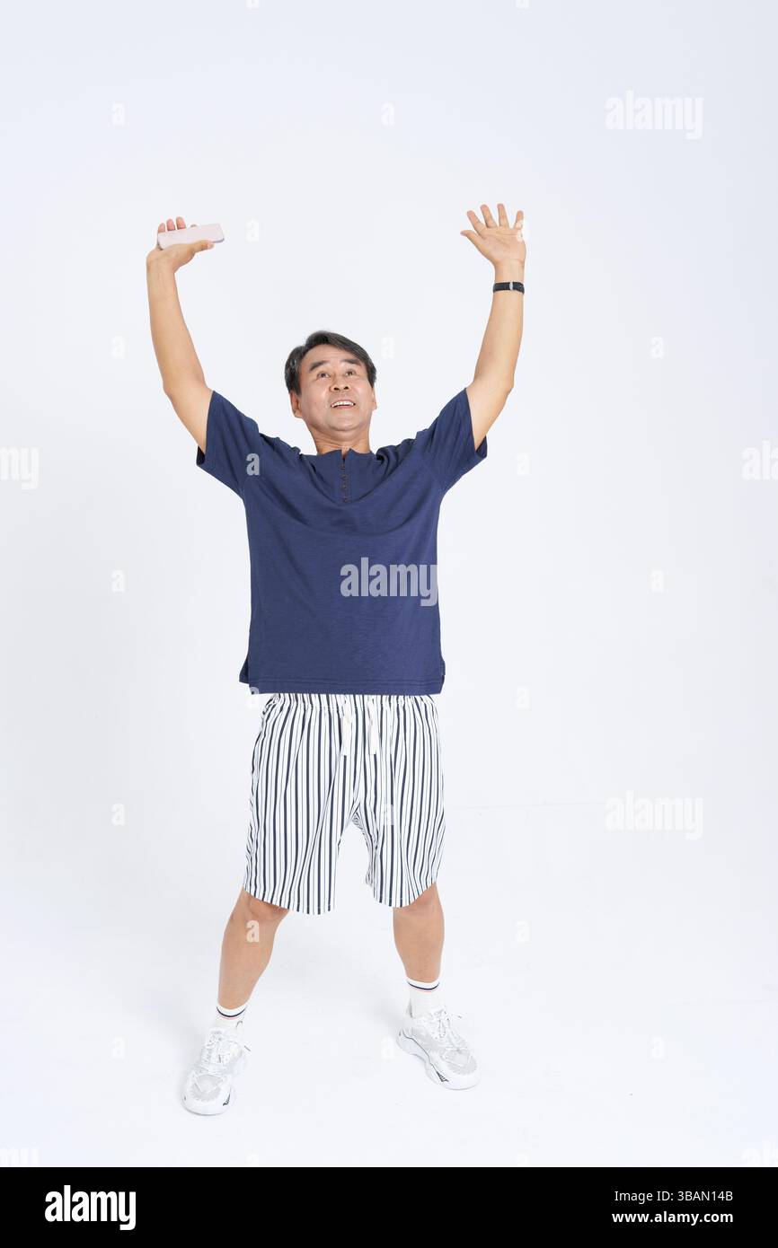An old man opening his arms, about to spring forward Stock Photo - Alamy