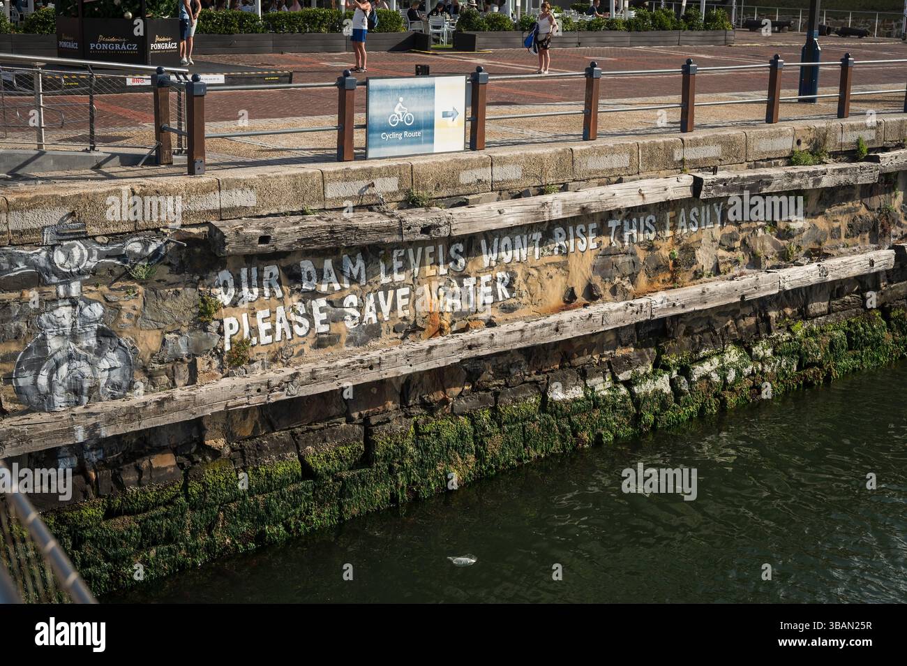 A mural warning people to conserve water in the V&A Waterfront shops in ...