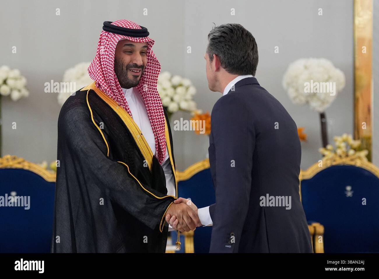 Saudi Crown Prince Mohammed bin Salman shakes hands with Secretary of ...