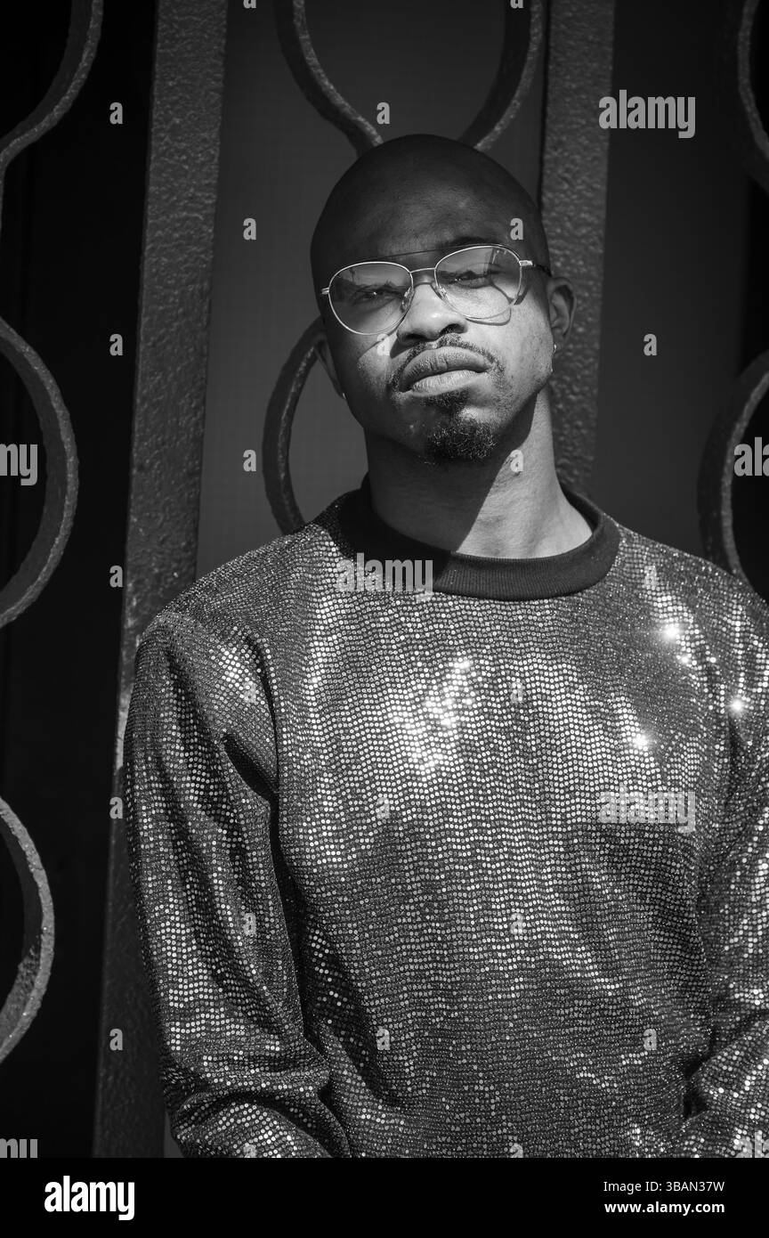 A local artist with a silver lame top in the Observatory neighbourhood ...