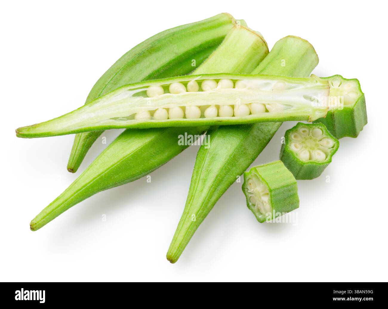 Okra green seed pods, and and longitudinal cut of okra pod isolated on ...