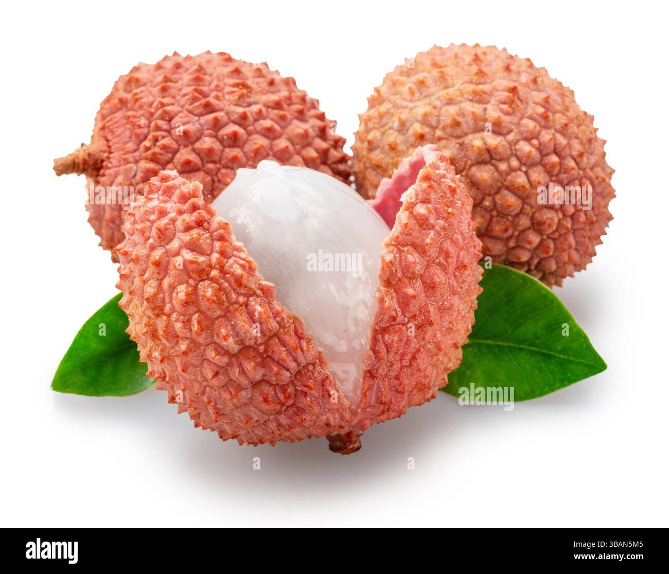 Lychee fruits with green leaves and one lychee peeled in half isolated ...