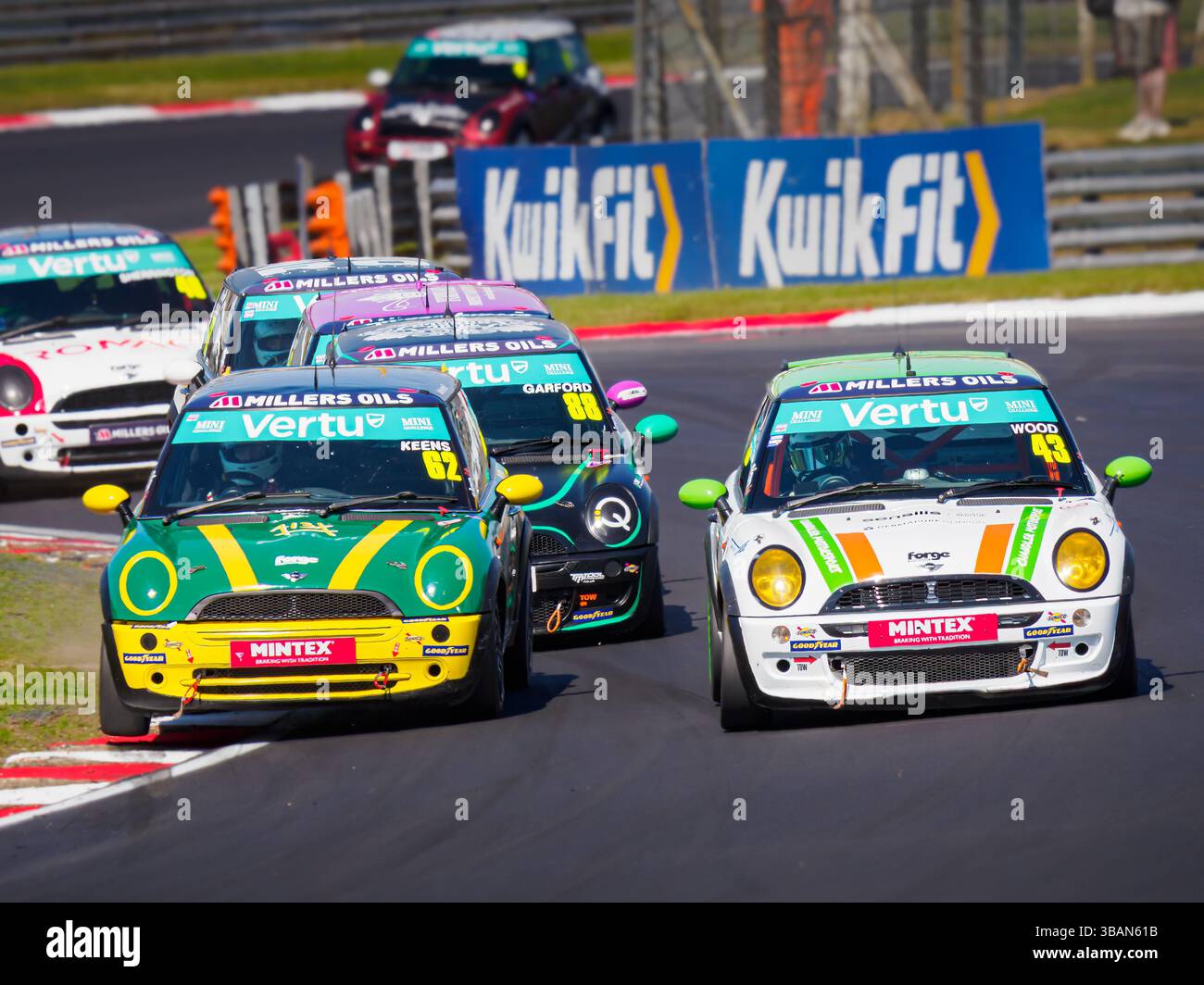 Mini Coopers racing in the Vertu MINI CHALLENGE Trophy race, Brands ...