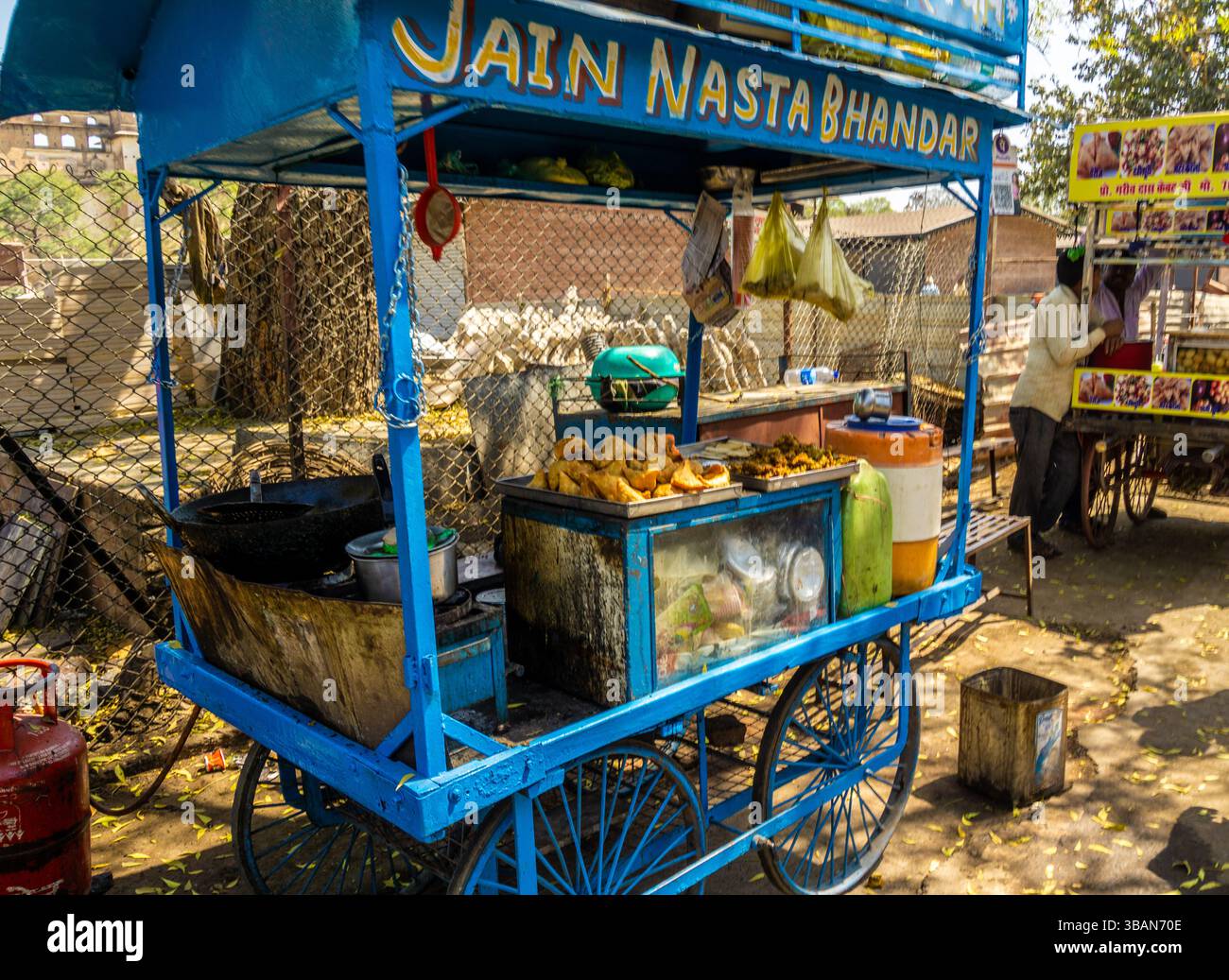 Mobile street food stall in Northern India selling snacks suitable for ...