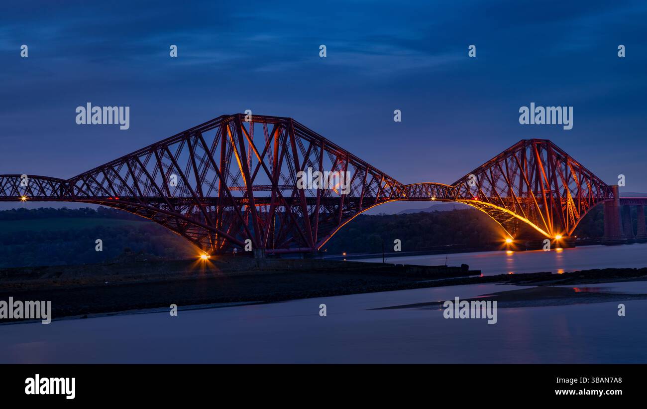 The Forth Bridge crosses the Firth of Forth near Edinburgh Stock Photo ...