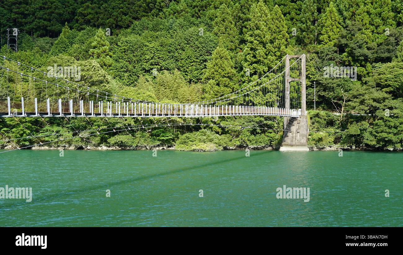 Suspension Bridge and Countryside Charm in Toyohashi, Japan Stock Photo ...