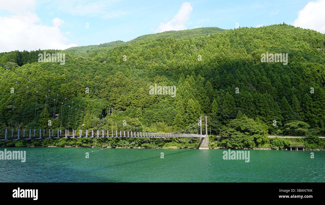 Suspension Bridge and Countryside Charm in Toyohashi, Japan Stock Photo ...