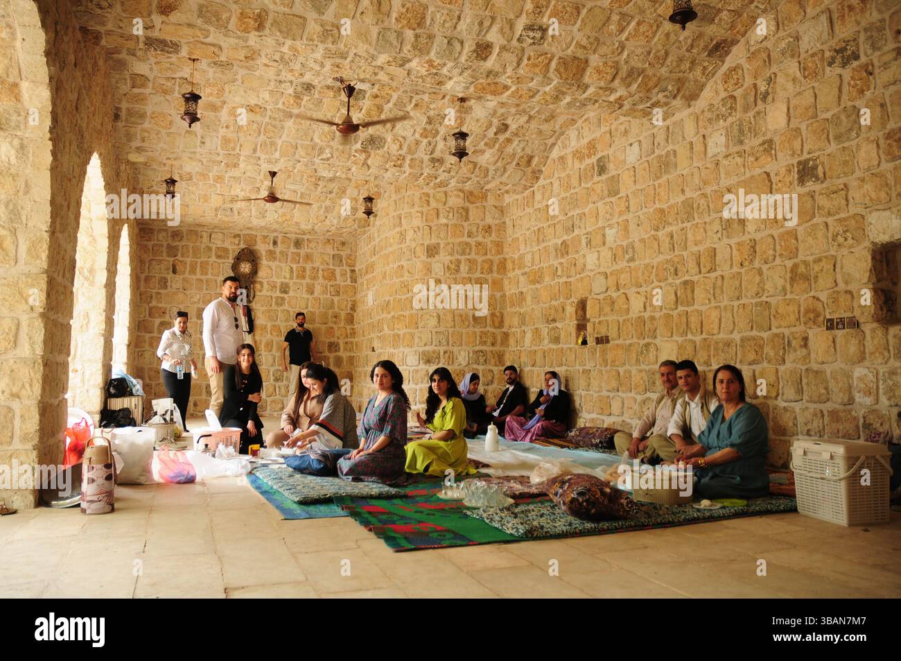 Lalish, Iraq. 12th May, 2025. A Yazidi family is seen at Lalish Temple, which is considered as ...