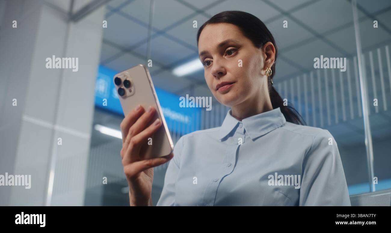 Airport Terminal: Businesswoman Scanning Boarding Pass Using Smartphone ...