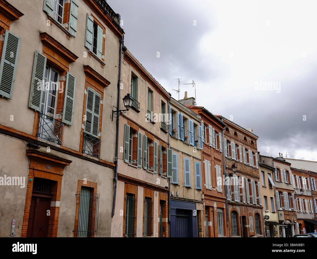 Traditional buildings, shops, businesses, and apartments, on Rue Emile ...