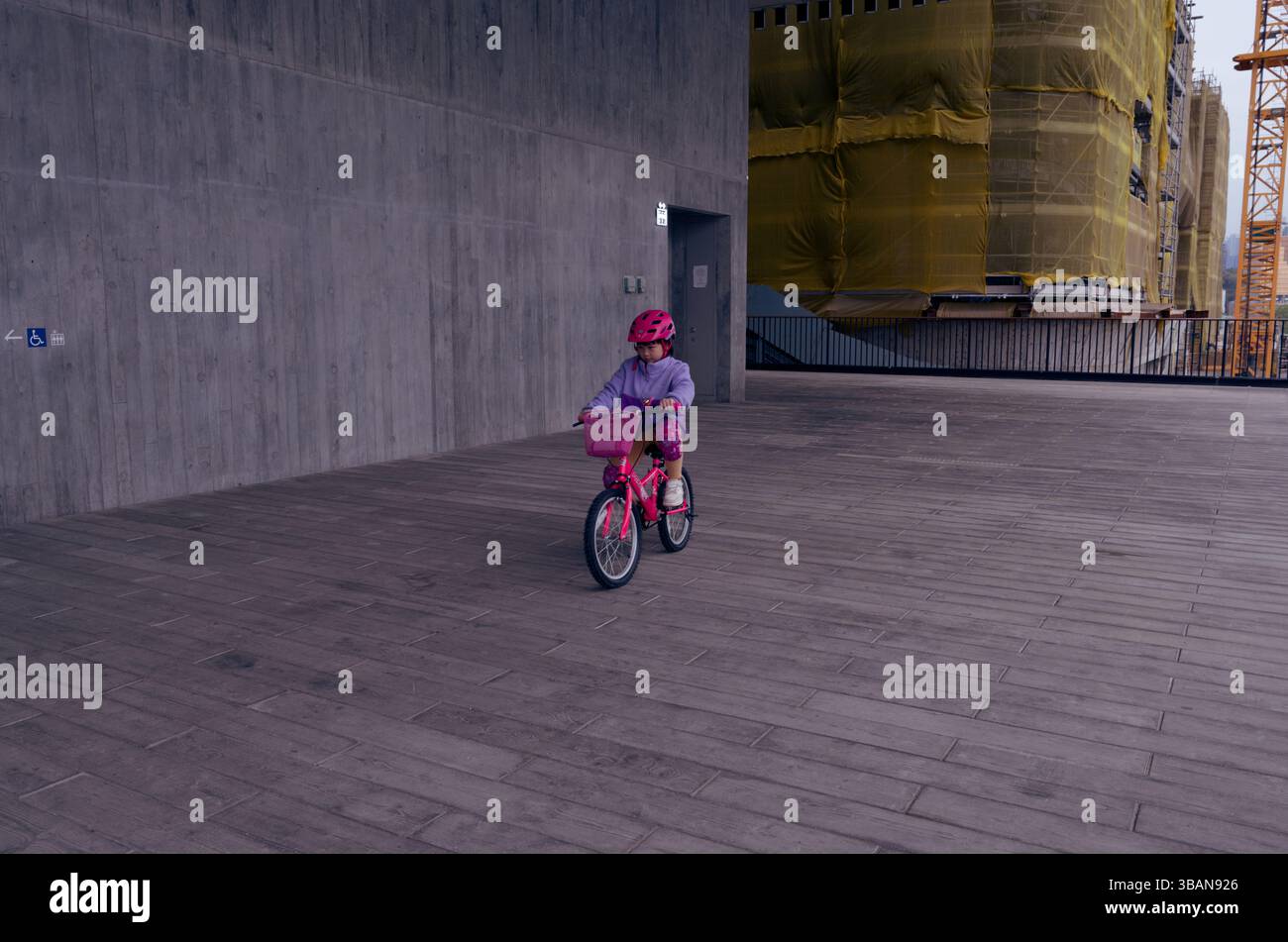 Girl rides pink bicycle hi-res stock photography and images - Alamy