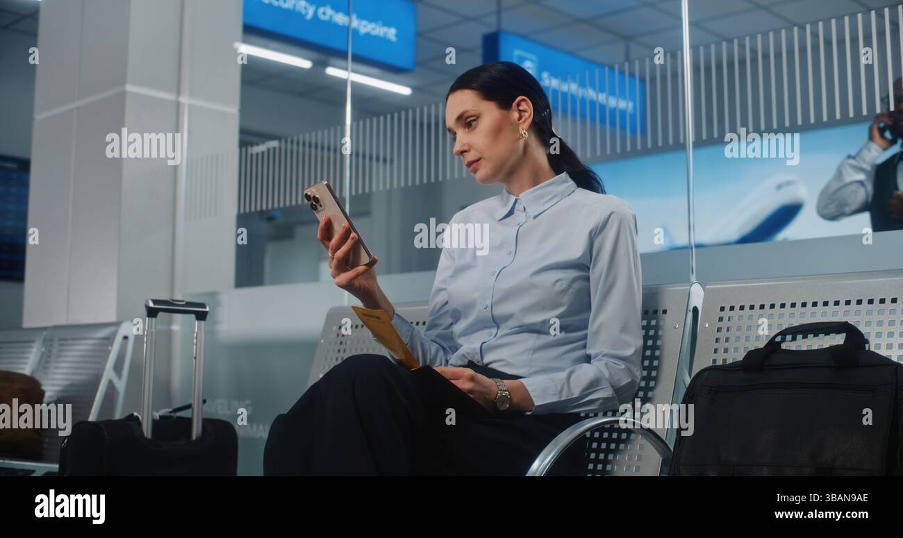 Airport Terminal: Successful Businesswoman Scanning Boarding Pass Using ...