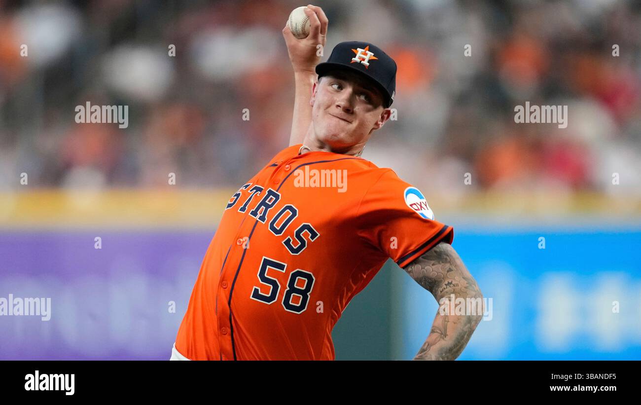 Houston Astros starting pitcher Hunter Brown throws during a baseball ...
