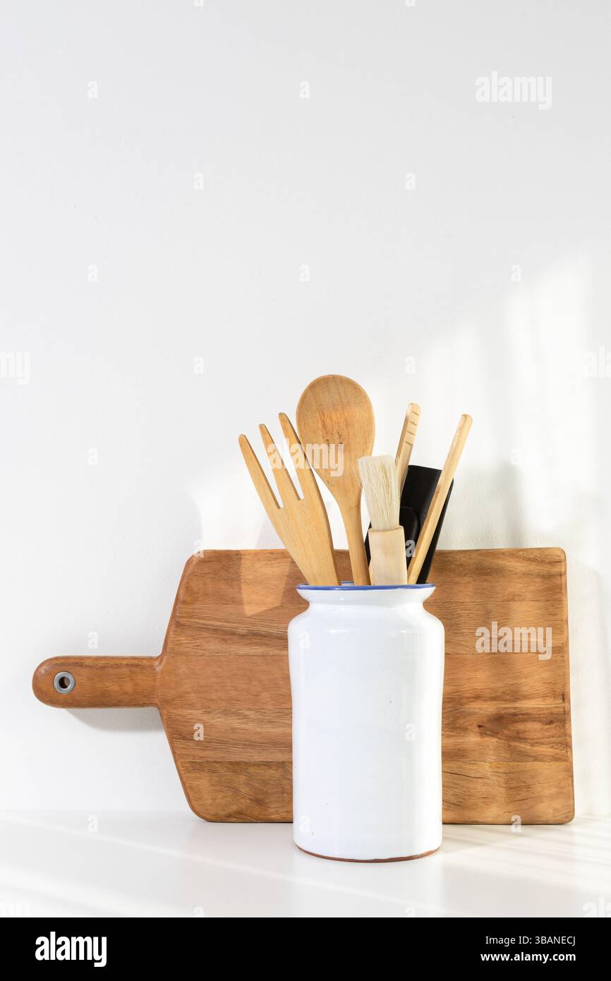 Wooden kitchen utensils on white background. Cooking background with ...