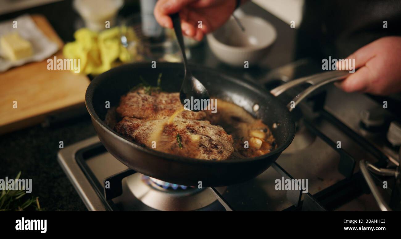 Cooking, stove and chef with steak in pan in kitchen for culinary skill ...