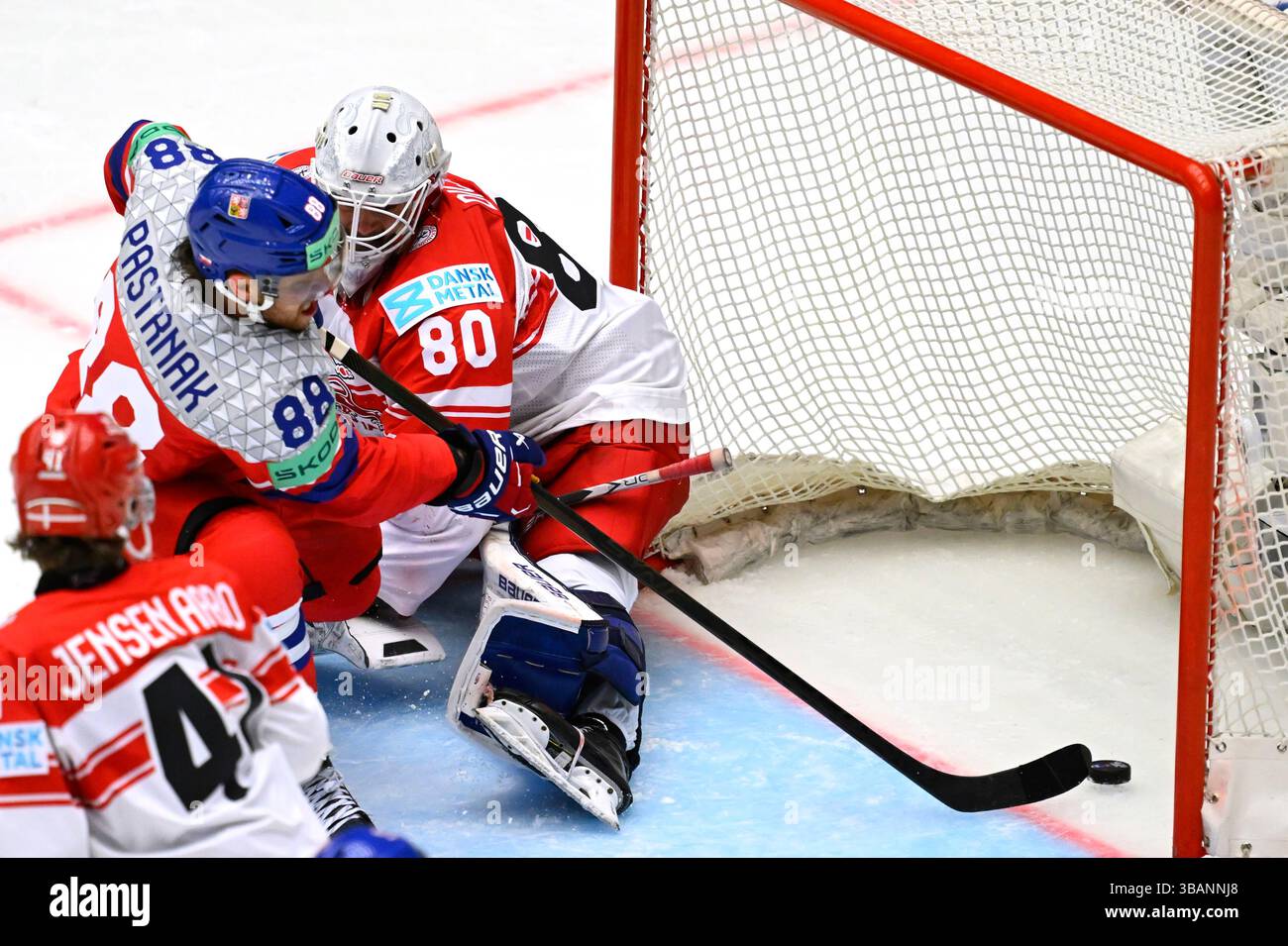 Herning, Denmark. 12th May, 2025. Goalkeeper Frederik Dichow, Denmark, David Pastrnak, Chech ...