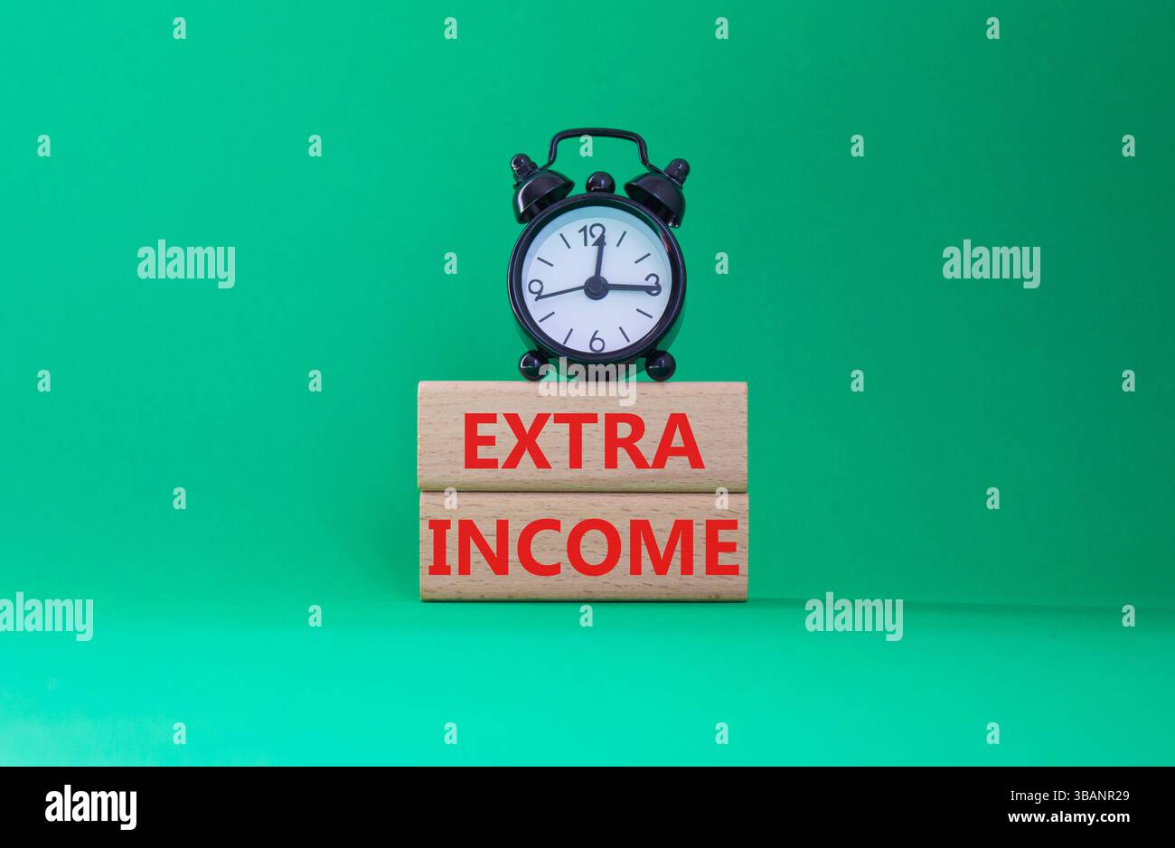 Extra Income symbol. Concept words Extra Income on wooden blocks ...