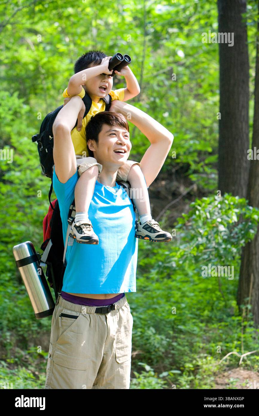 Chinese father and son in the great outdoors Stock Photo - Alamy