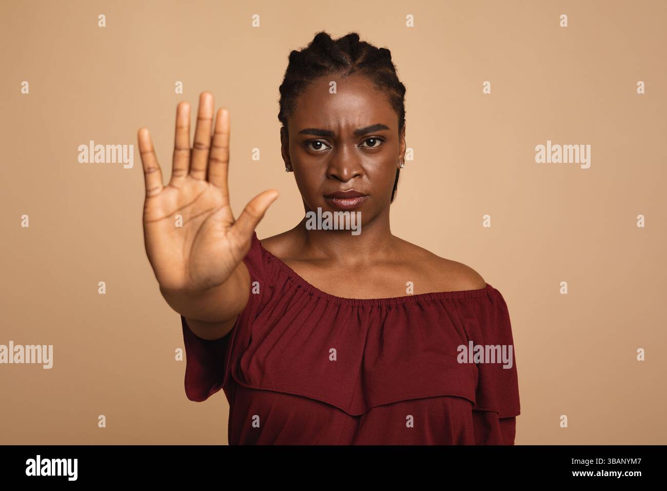 Young angry african american woman in casual outfit making the hand ...