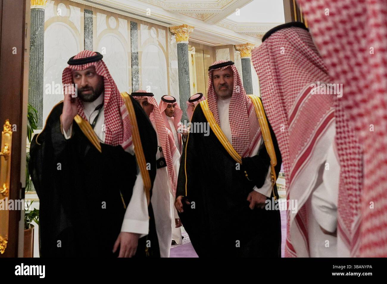 Prince Faisal bin Salman, center, and other Saudi officials depart a ...