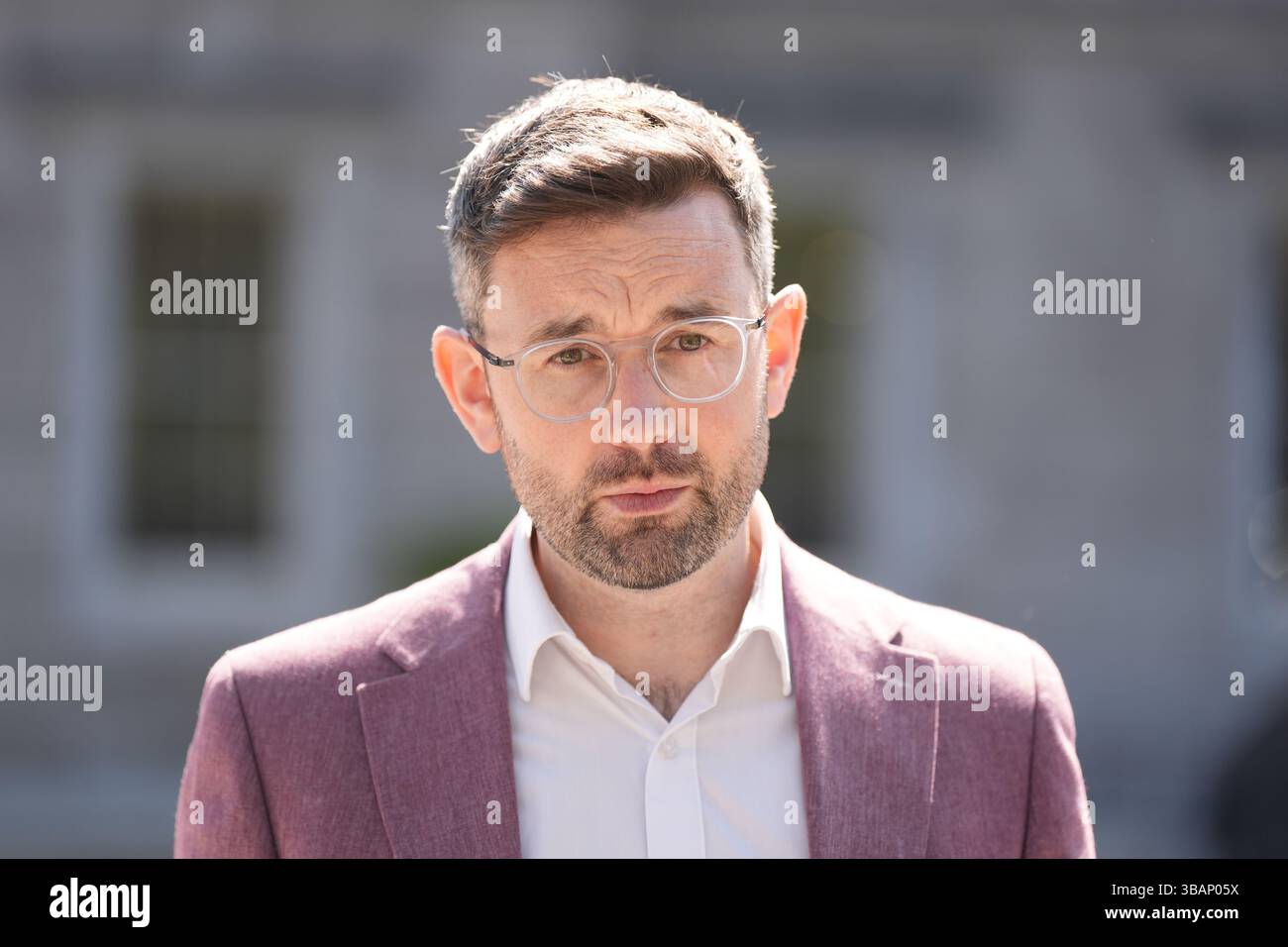 Padraig Rice TD of the Social Democrats speaking to the media outside ...