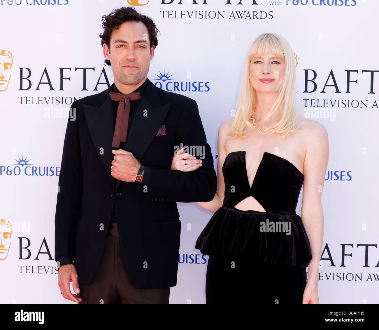 London, UK. 11th May, 2025. Alex Hassell and Emma King attend the BAFTA ...