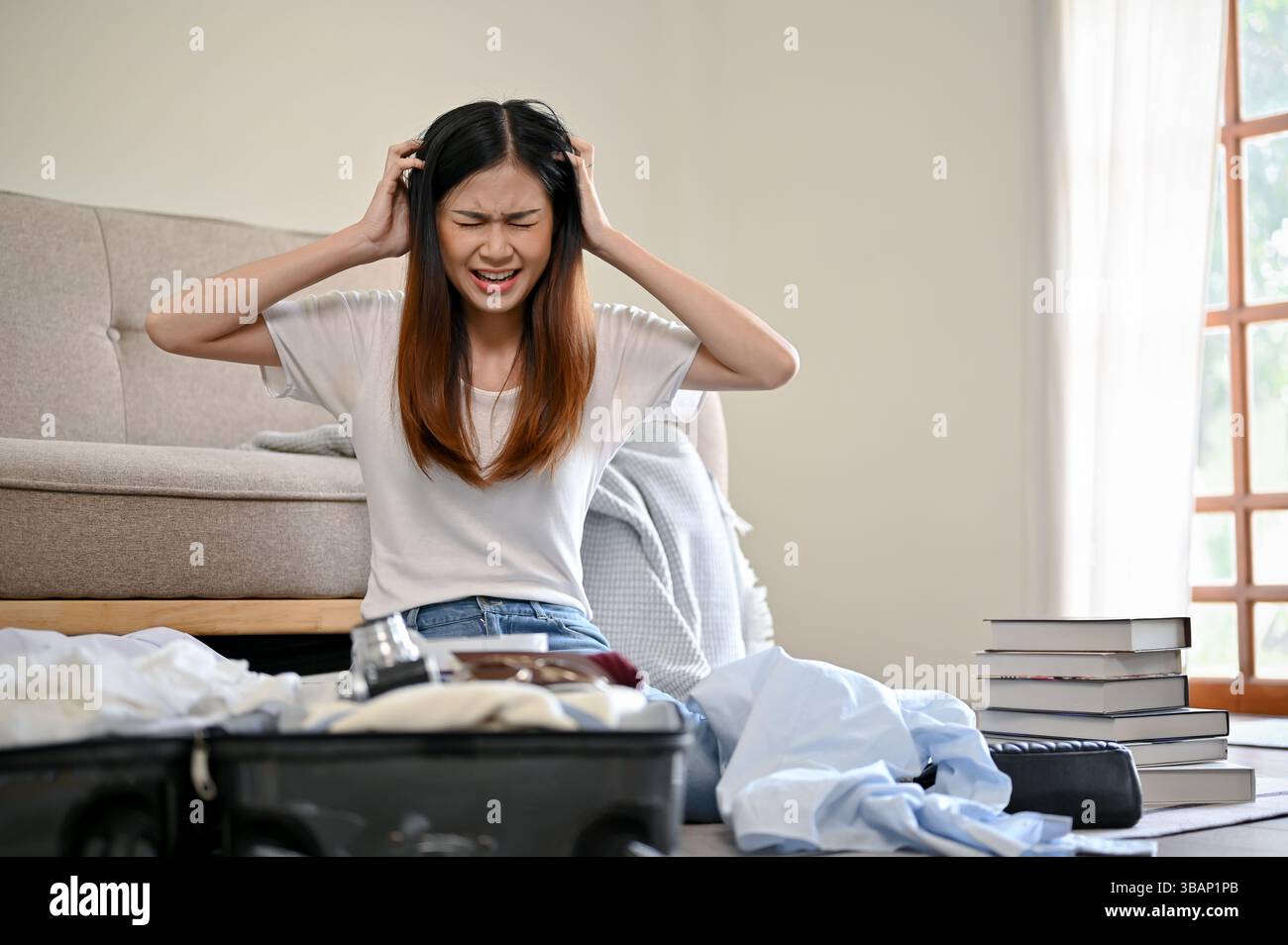 An unhappy and furious young Asian woman feels stressed about her ...