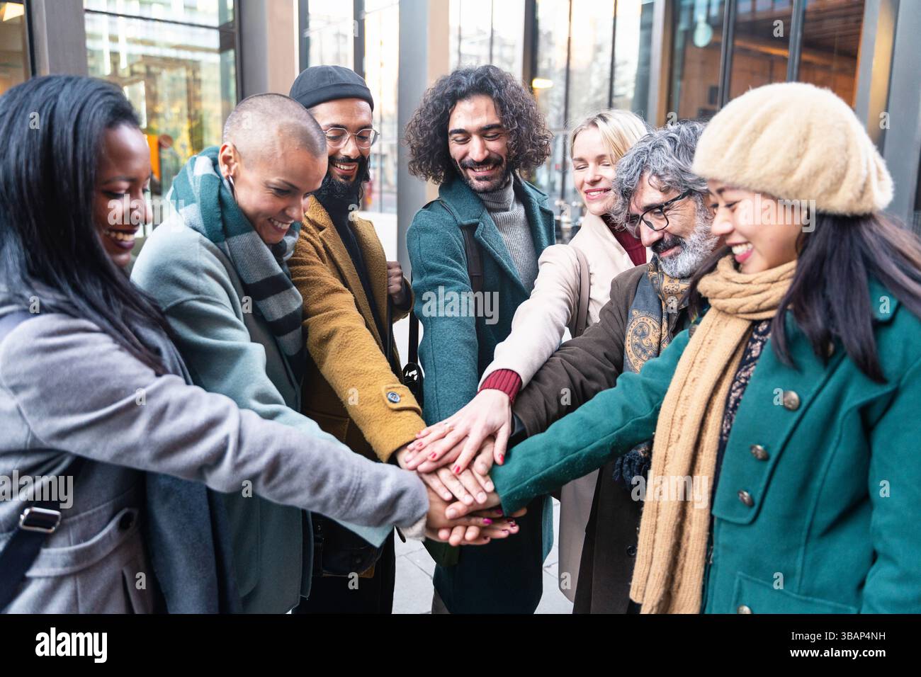 Group Group of positive professional coworker people stacking hands ...