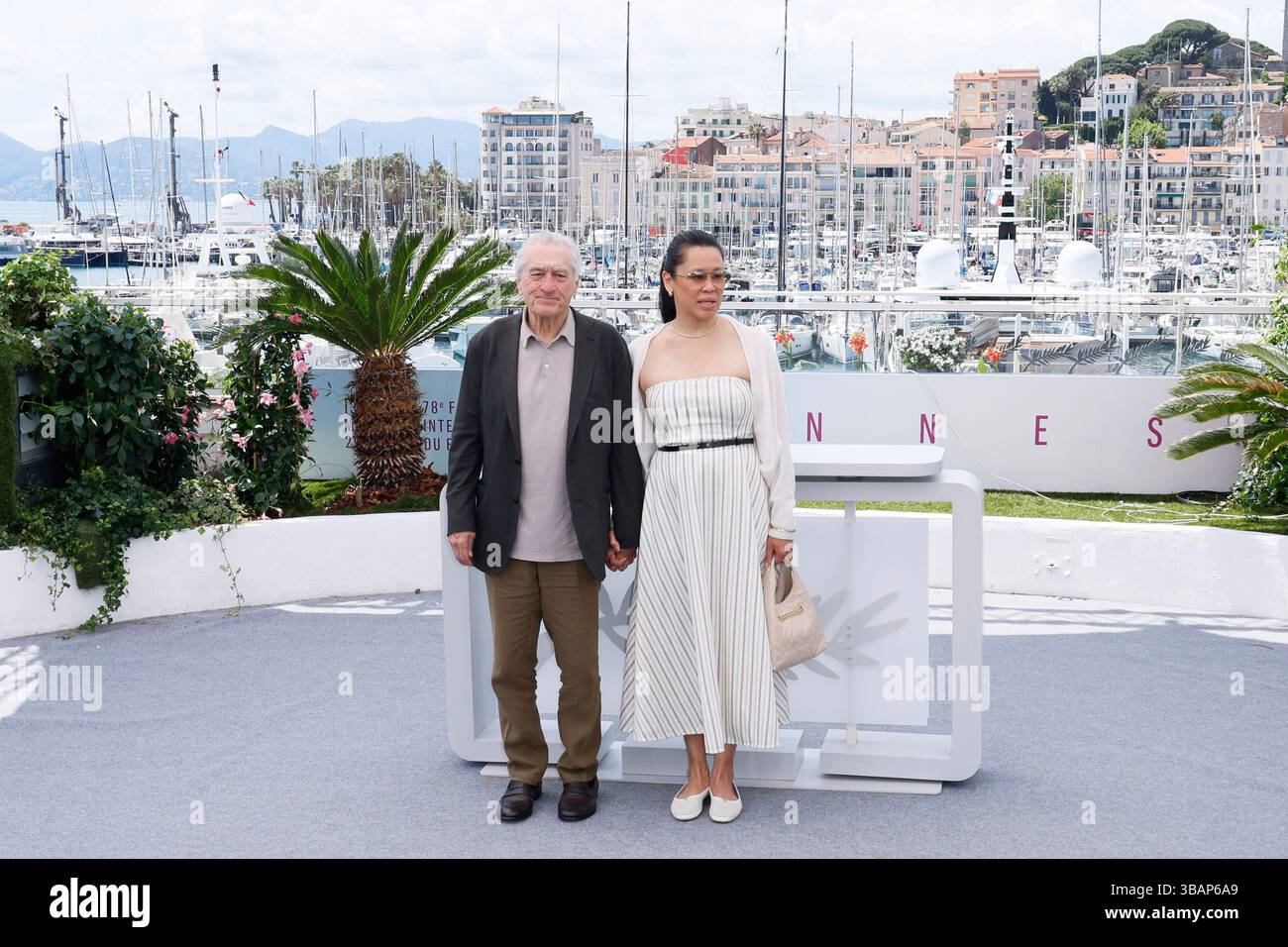 Honorary Palme d'Or recipient Robert De Niro, left, and Tiffany Chen ...