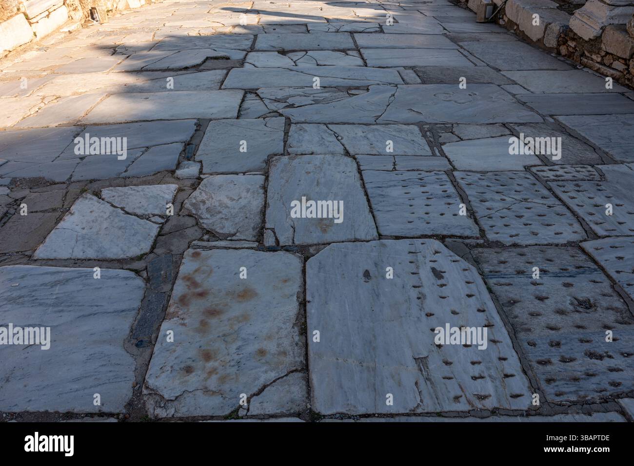 Paved section of Curetes Street in Ephesus, with worn marble slabs and ...