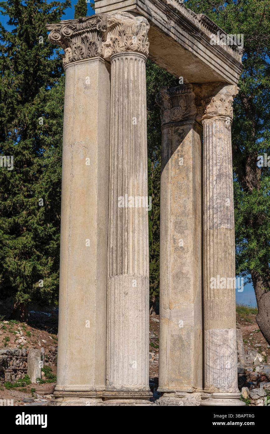 Ruined stone columns at Ephesus, fluted and worn, standing alone as ...