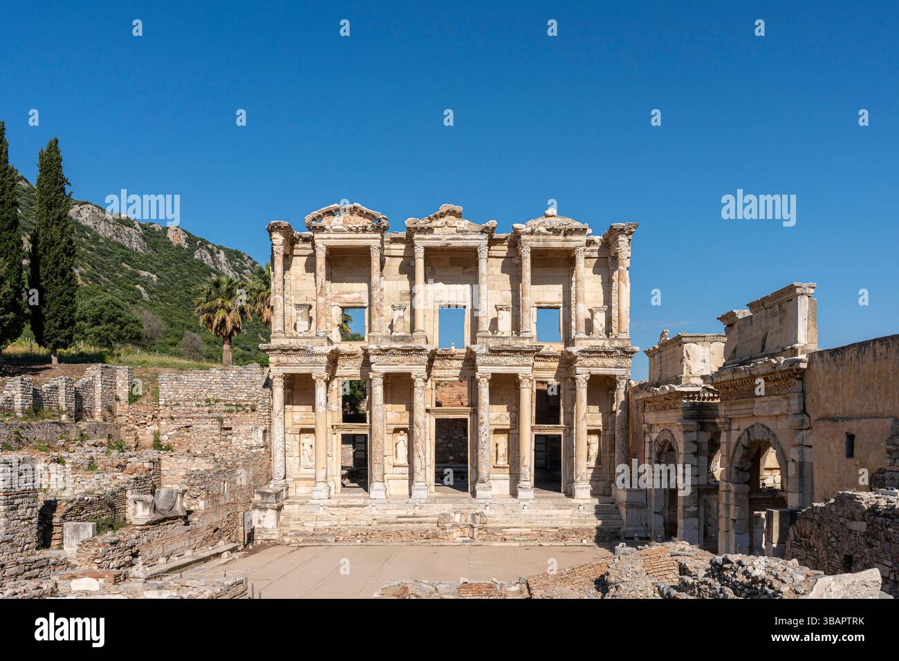 front view of the Celsus Library in Ephesus, with restored columns and ...